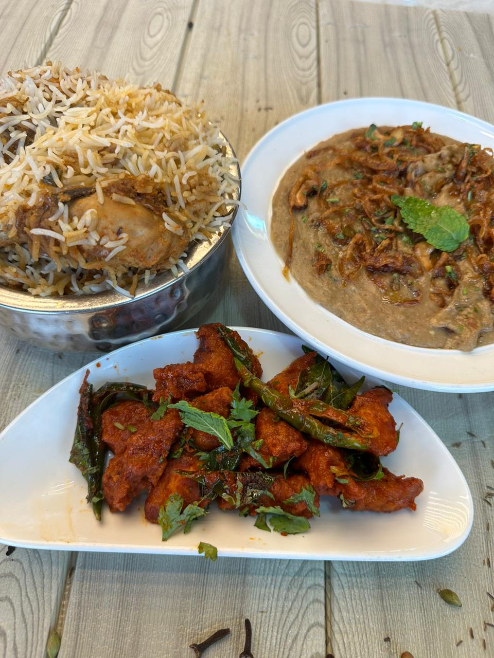 Mutton Haleem 28oz + Mutton Biryani 28oz + Chicken 65 (Two pax meal)