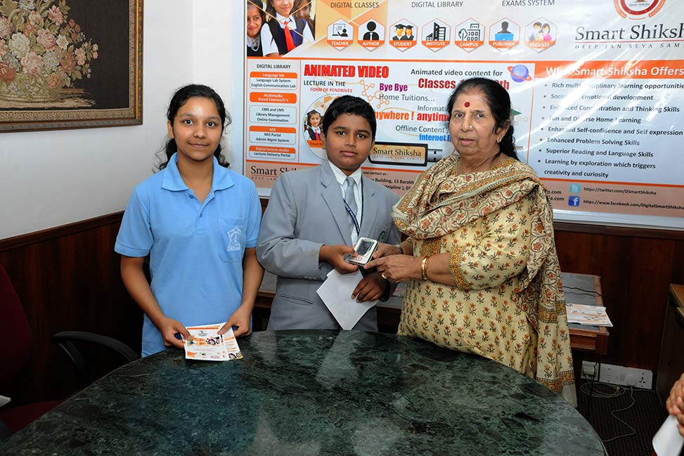 Smart Shiksha System Distribution Smt. Shashi Soni / Footprints, Bangalore,