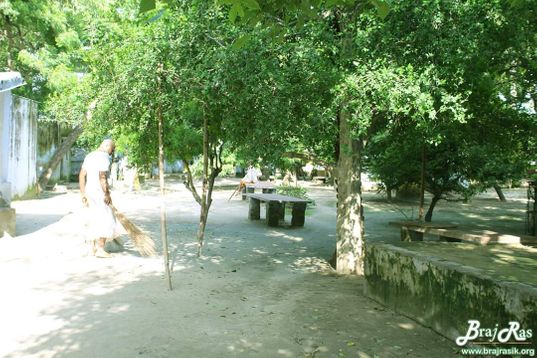 Sadhus doing Jhadu sewa or Sohni sewa of Braj Raj at Tatiya Sthan.