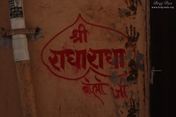 Glimpses of Shri Radha name written over a wall @ Vrindavan.
