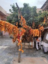 A sign board of Nand Bhavan or Chaurasi Khamba Temple in Gokul.