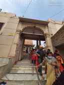 A sign board of Nand Bhavan or Chaurasi Khamba Temple in Gokul.