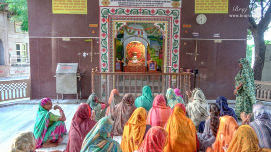 Devotees doing Sankirtan in the temple of Shri Radha Naam Sewa at the ...
